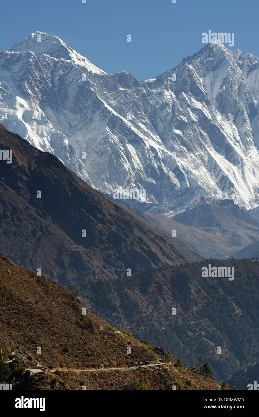 A trekker on the path above Namche Bazaar on the everest base camp trek ...