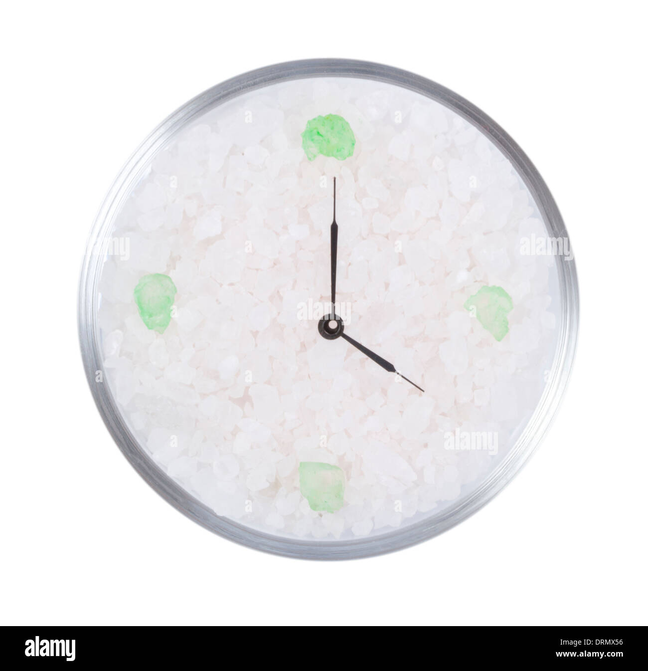Spa salt in the form of hours on a white background isolated Stock ...