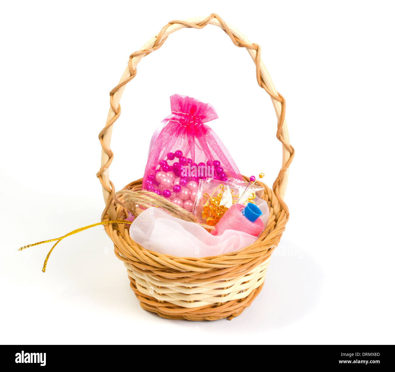 Basket with textile items isolated on white background Stock Photo - Alamy