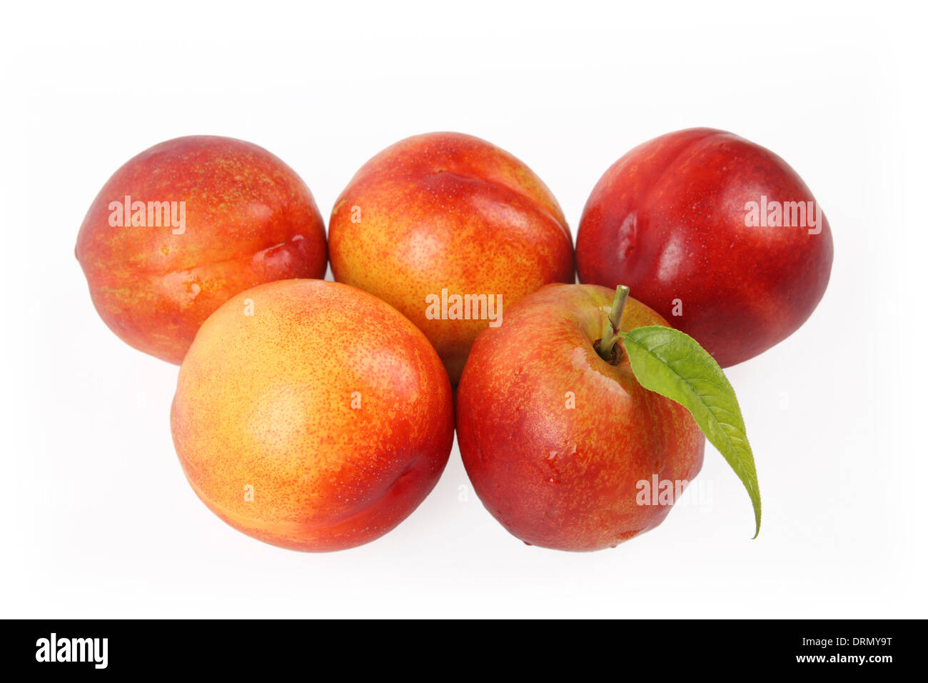 five fresh peaches Stock Photo - Alamy