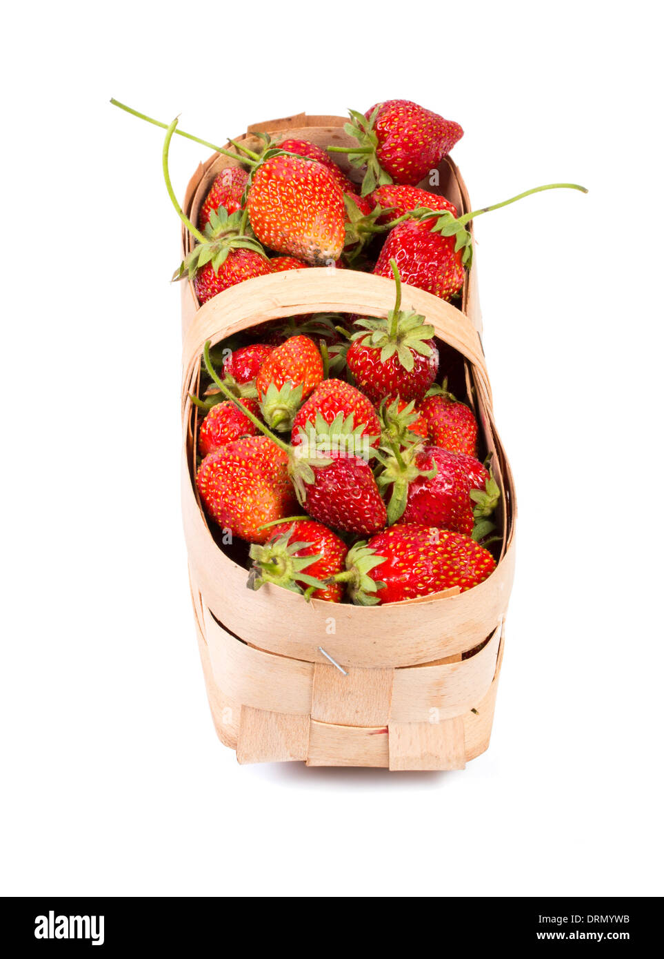 Strawberries in a basket isolated on a white background Stock Photo - Alamy
