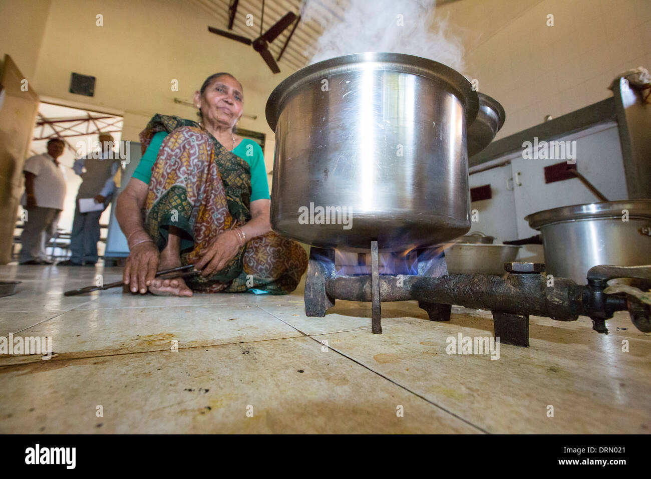 Cooking using biogas made on the premises at the Muni Seva Ashram in ...