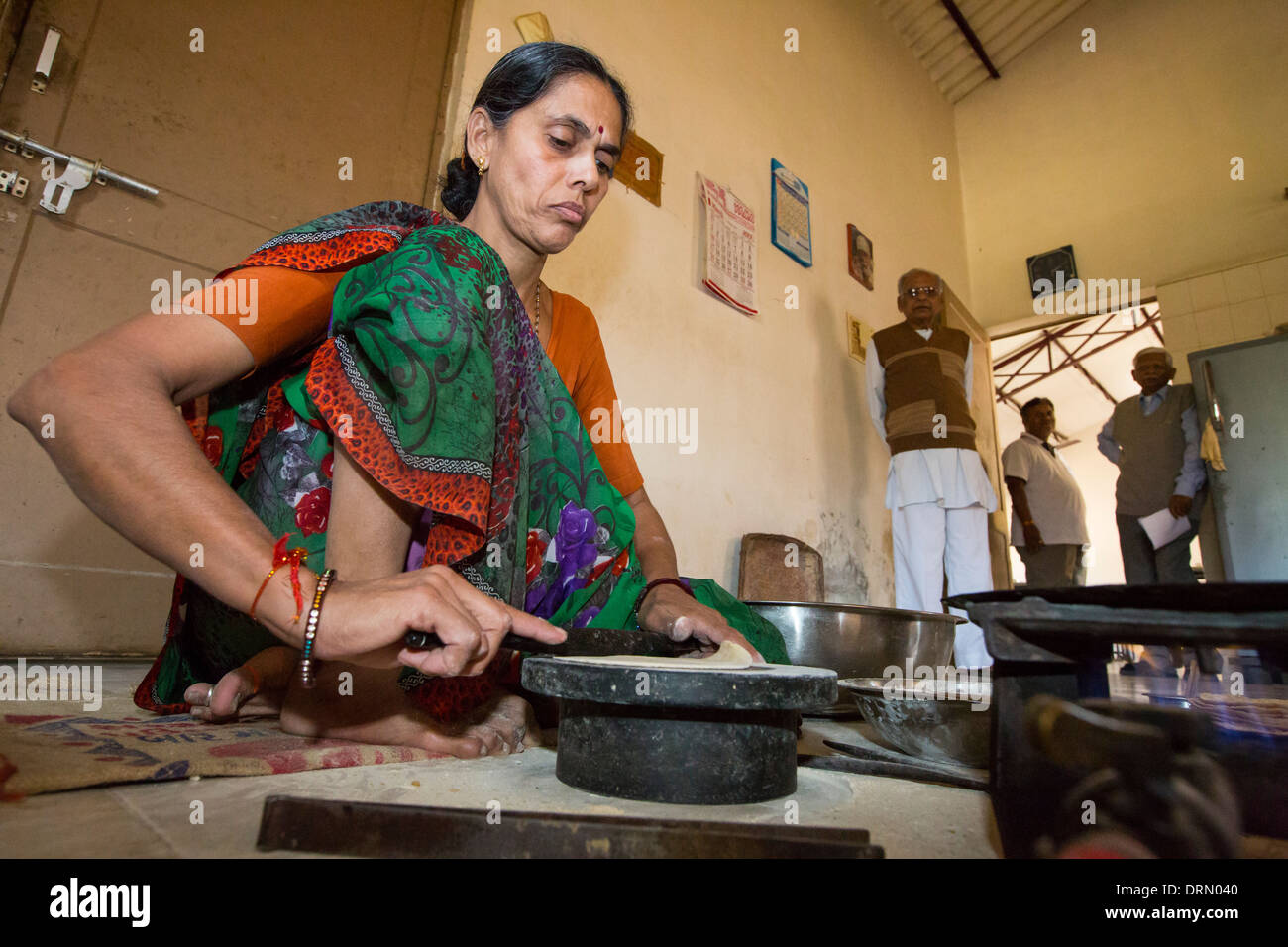 Cooking using biogas made on the premises at the Muni Seva Ashram in ...