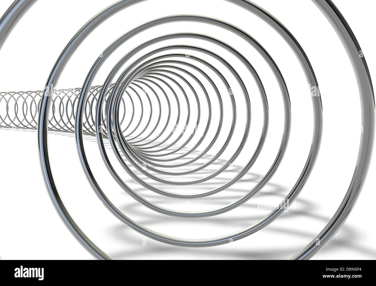 Metal spring on a white background Stock Photo - Alamy