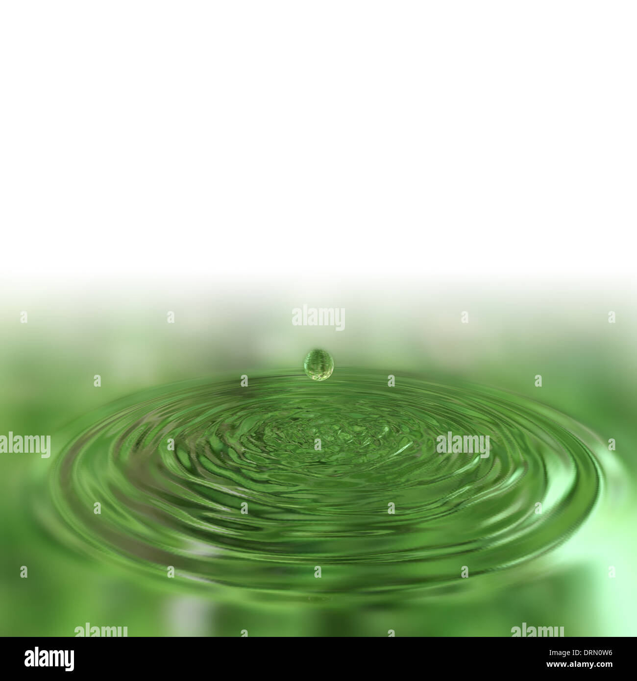 Drop falls into the water on the background of green forest Stock Photo ...