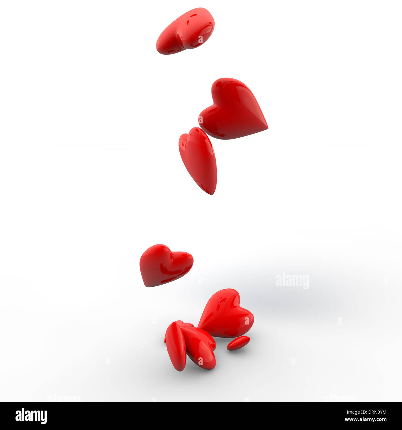3d hearts isolated on white background fall down Stock Photo - Alamy