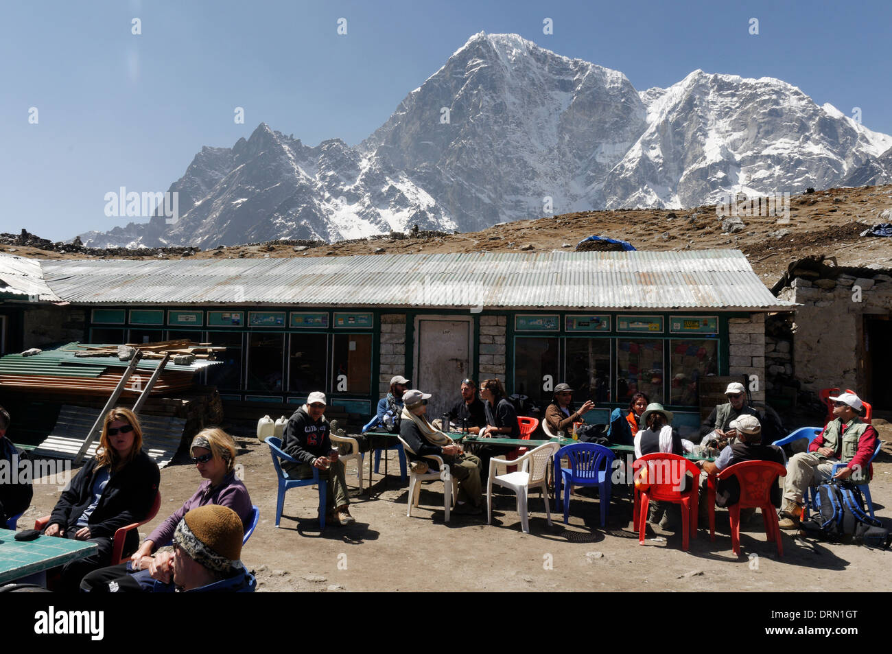 Trekkers at a tea house in Dughla on the Everest Base Camp trek, with ...