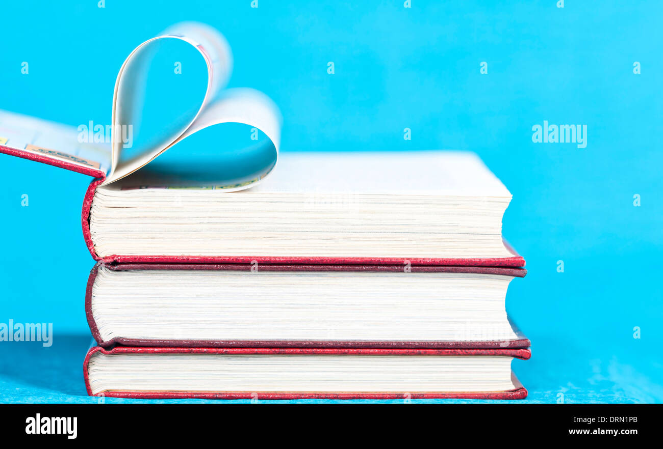 Open book pages heart hi-res stock photography and images - Alamy