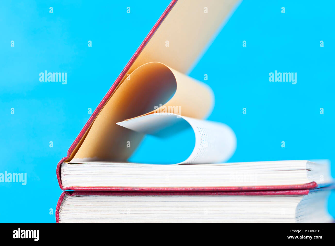 Heart shaped pages of a book Stock Photo - Alamy