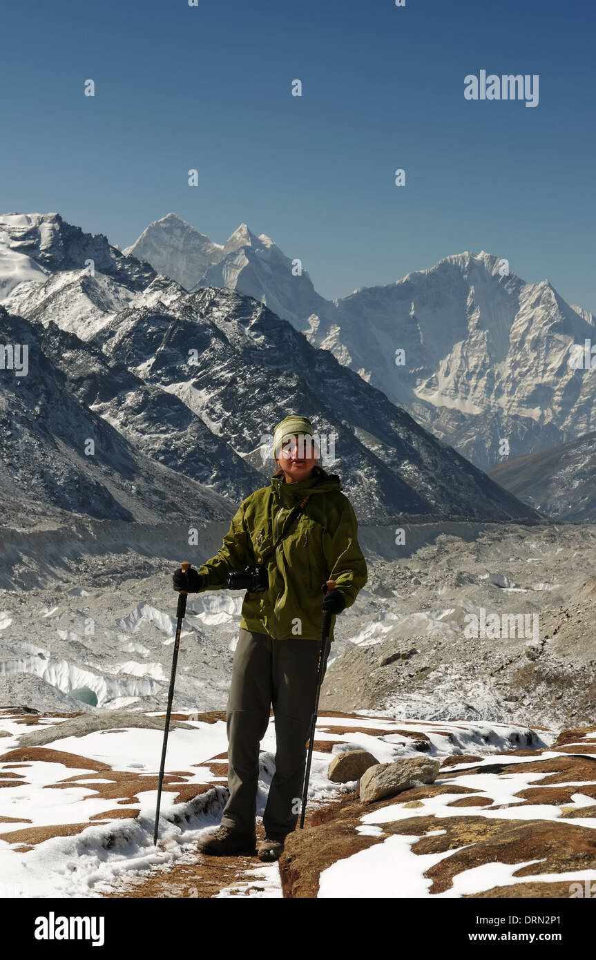 Trekker approaching the summit of Kala Patar at the end of the Everest ...