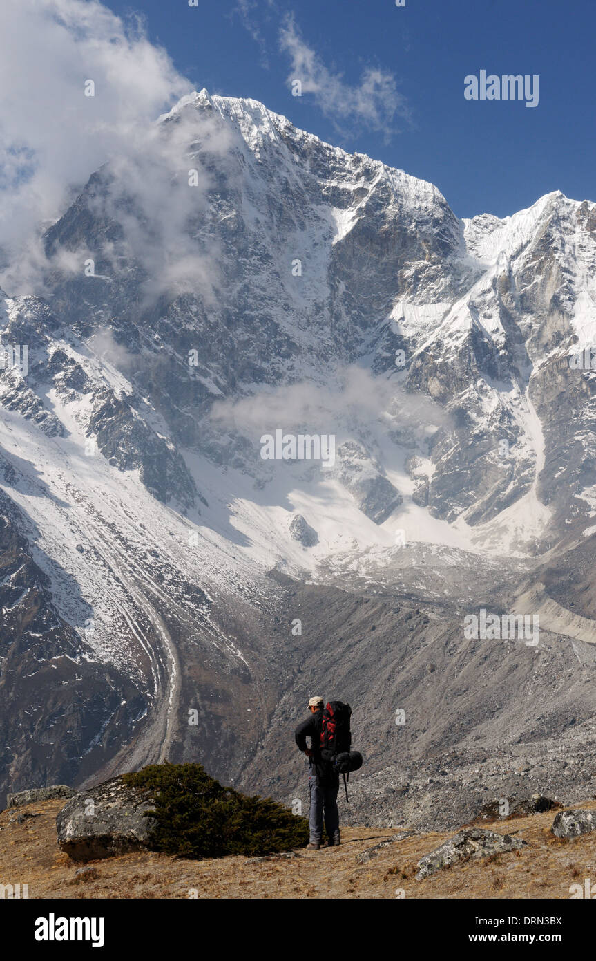 A lady trekker on the Everest Base Camp trek with Taweche beyond Stock ...