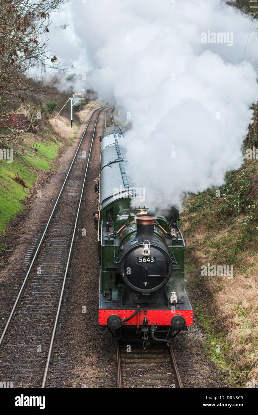 Looking down onto a steam train recreating a travel scene commonly seen ...