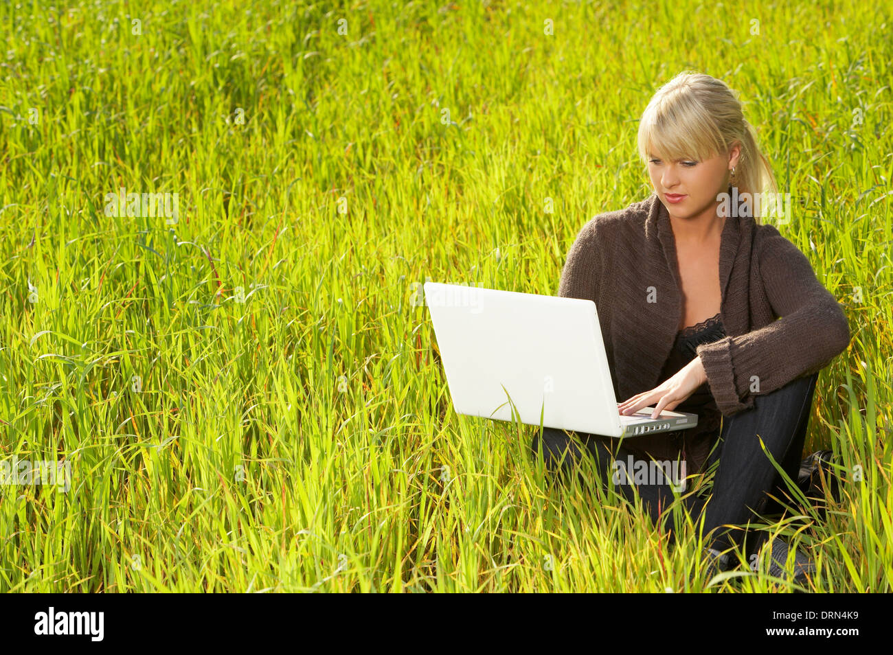 Green grass woman hi-res stock photography and images - Alamy