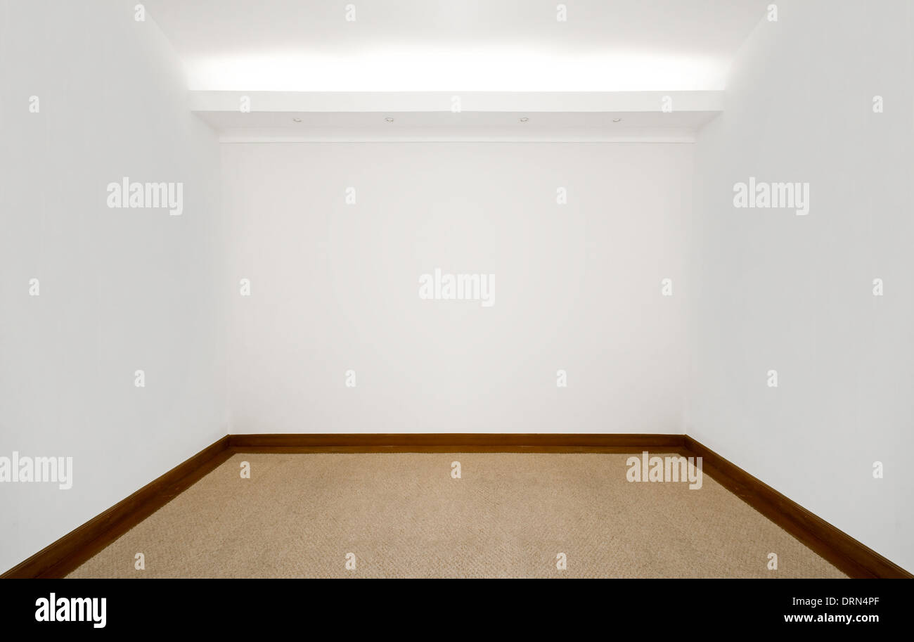 Empty white room with carpeted floor Stock Photo - Alamy