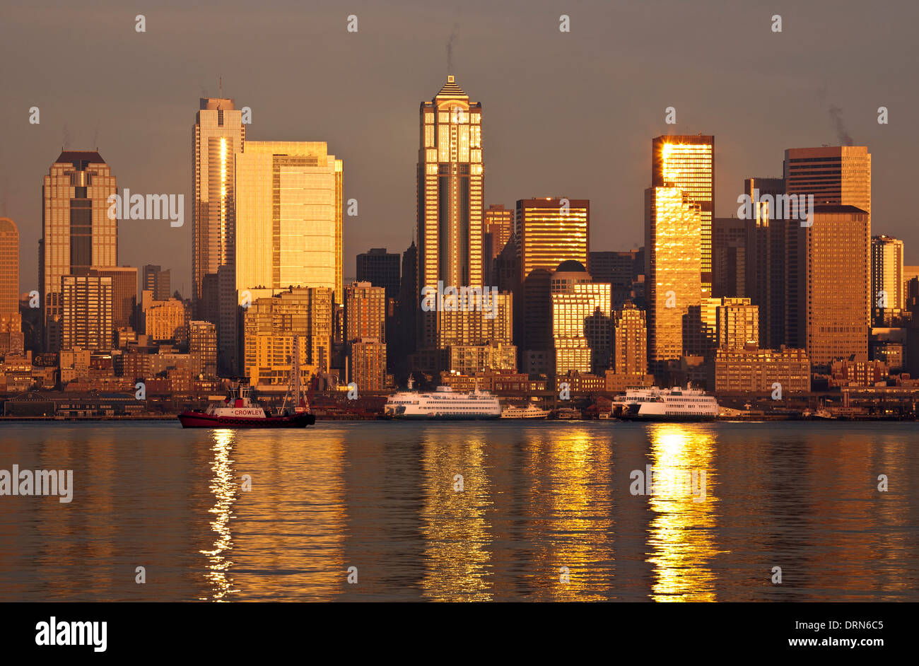 WASHINGTON -Cross-Sound ferry boats near Colman Dock and a tugboat on ...