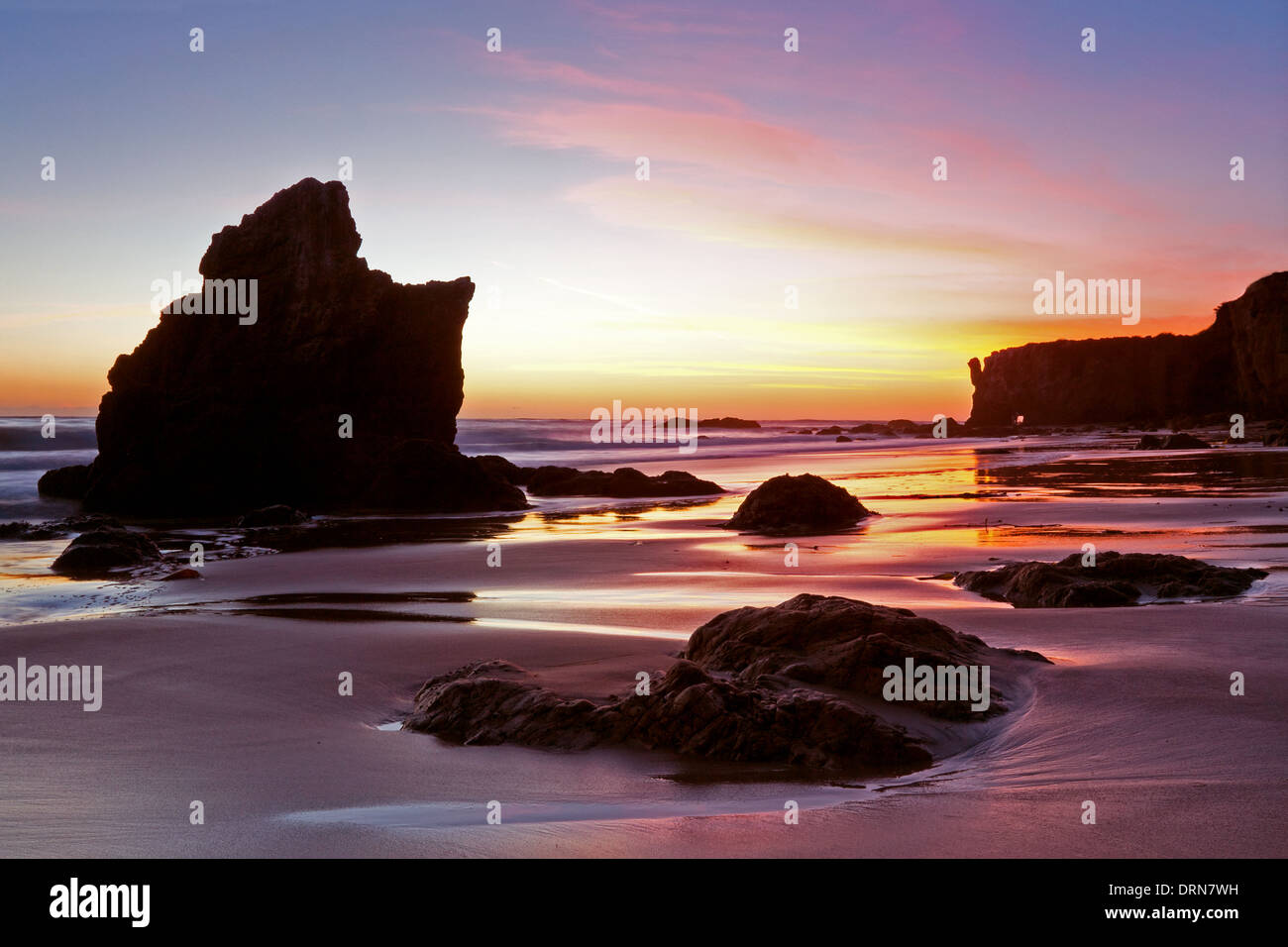 Sea stacks at sunset, El Matador State Beach, Malibu, California USA ...