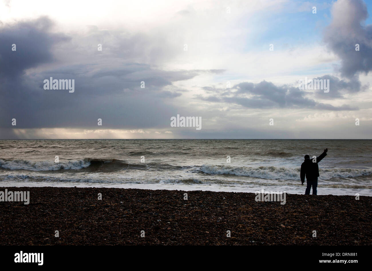 A man praying and chanting at the sea Stock Photo - Alamy