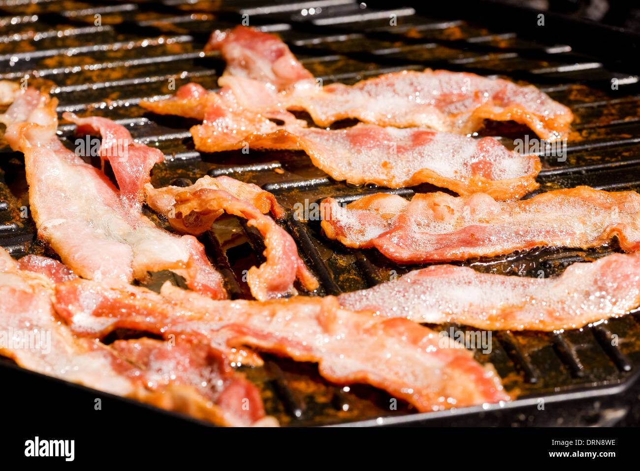 Frying Bacon Detail Stock Photo - Alamy