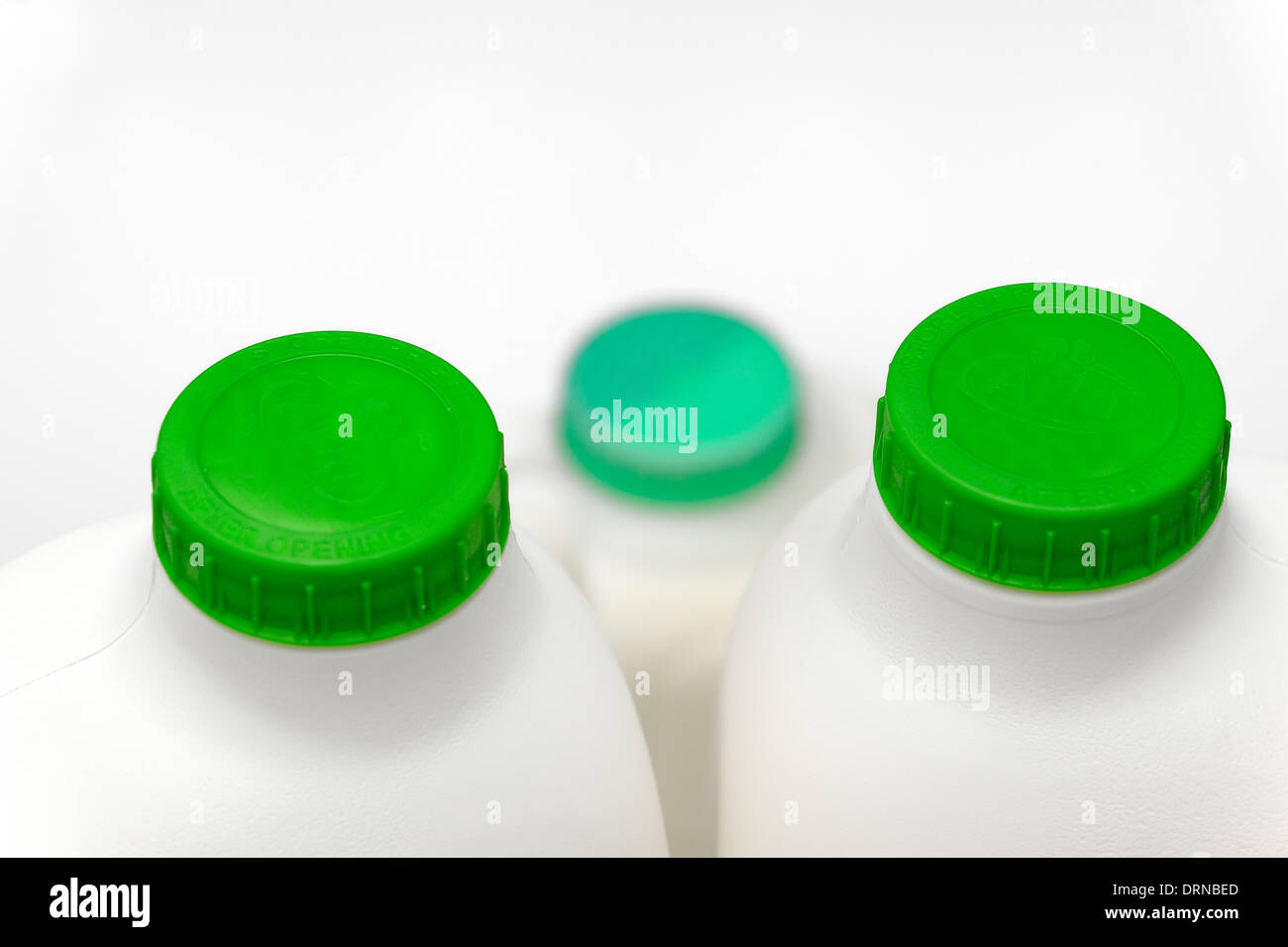 Green top plastic pet milk bottles purefiltre cravendale Stock Photo ...