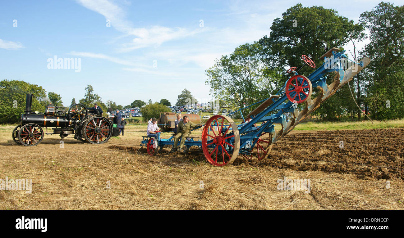 The plough leaving steam ploughing engine Sunrise at Bedford rally ...