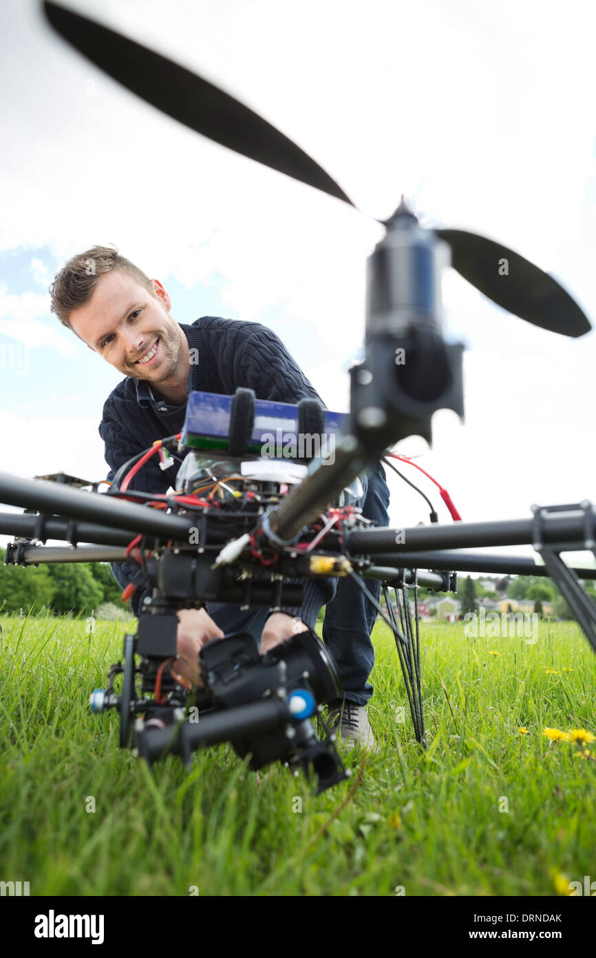 Technician Assembling Camera On UAV Drone Stock Photo - Alamy
