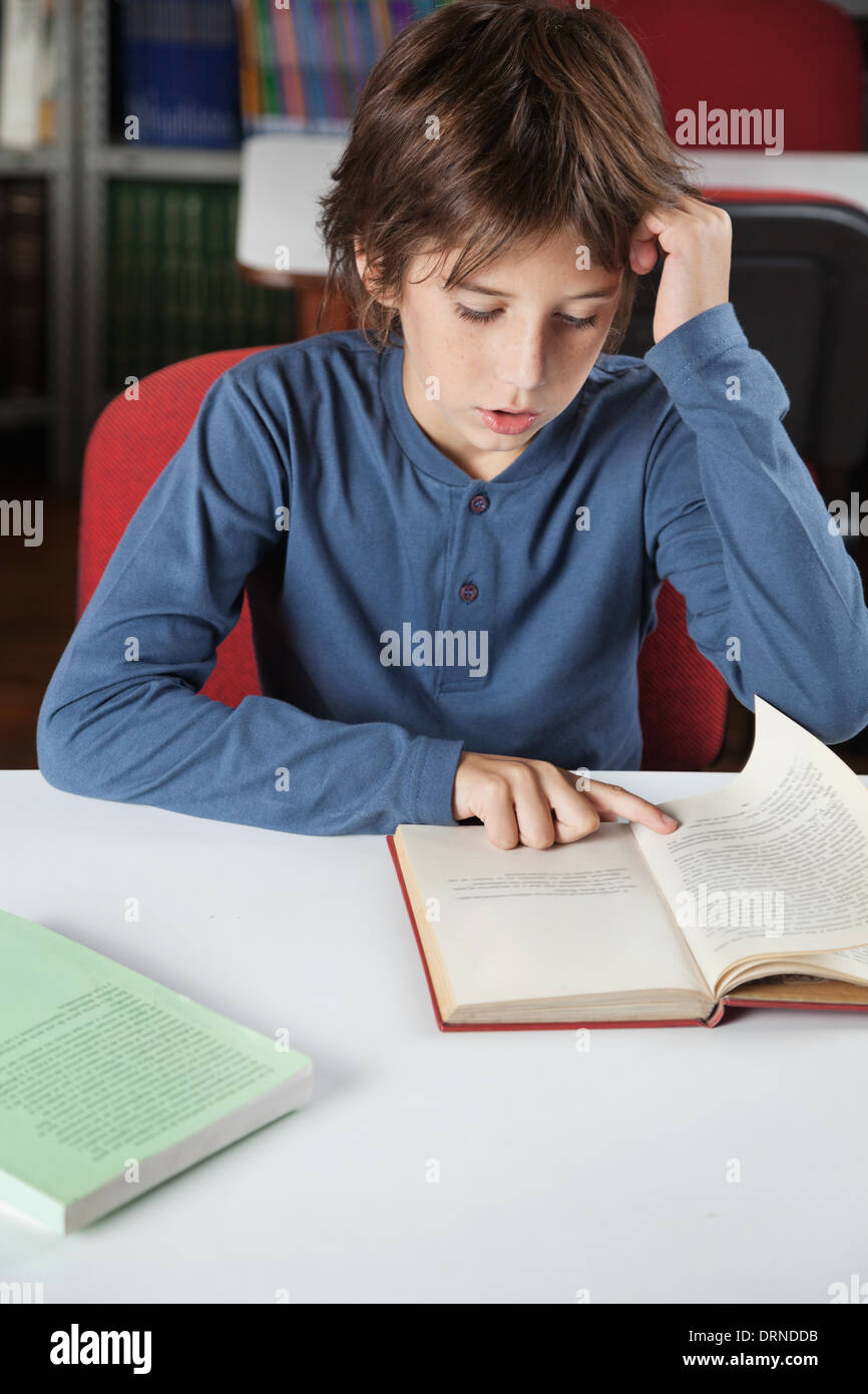 Schoolboy reading book hi-res stock photography and images - Alamy Schoolboy reading book hi-res stock photography and images - Alamy