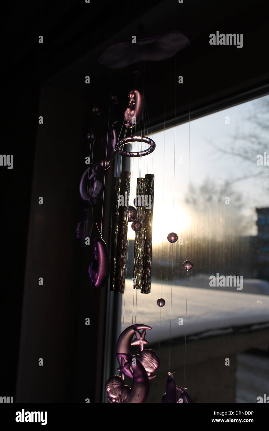 Chinese violet crystal sound of wind hang on the window Stock Photo - Alamy
