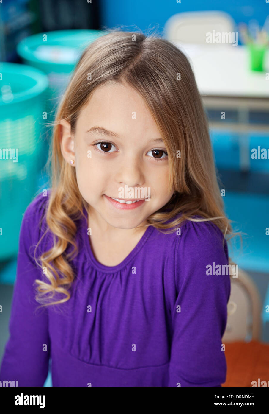 Girl Smiling In Classroom Stock Photo - Alamy