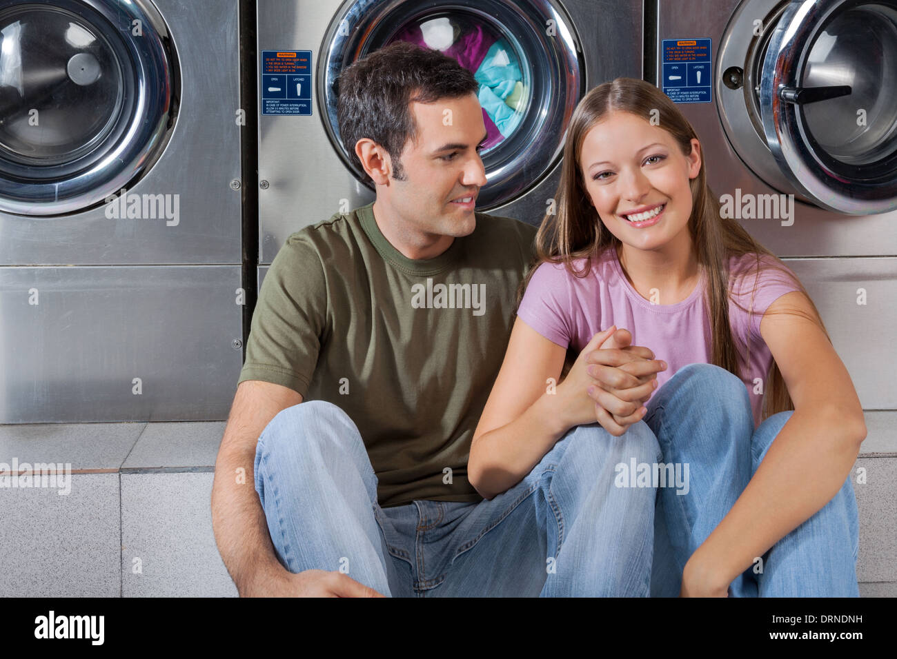 Women hand washing clothes hi-res stock photography and images - Alamy