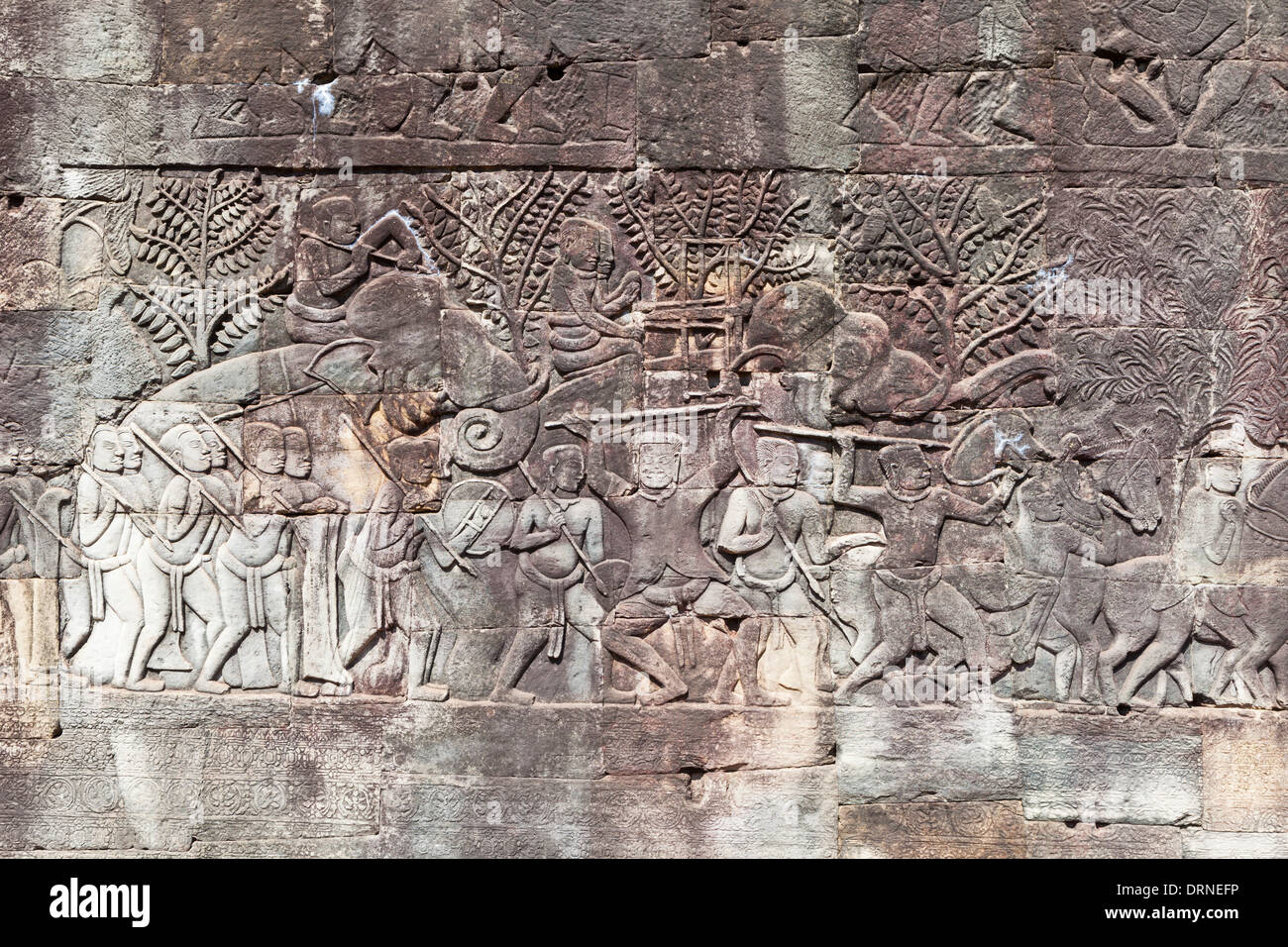 Bas reliefs on the west side of the Bayon temple, Cambodia Stock Photo ...