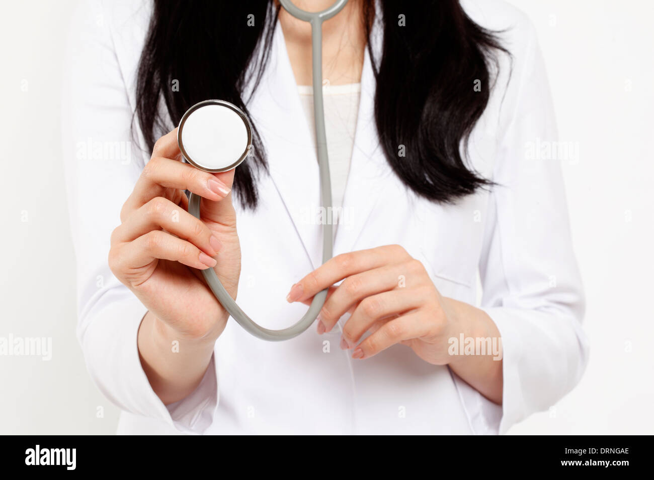 Female doctor takes stethoscope Stock Photo - Alamy
