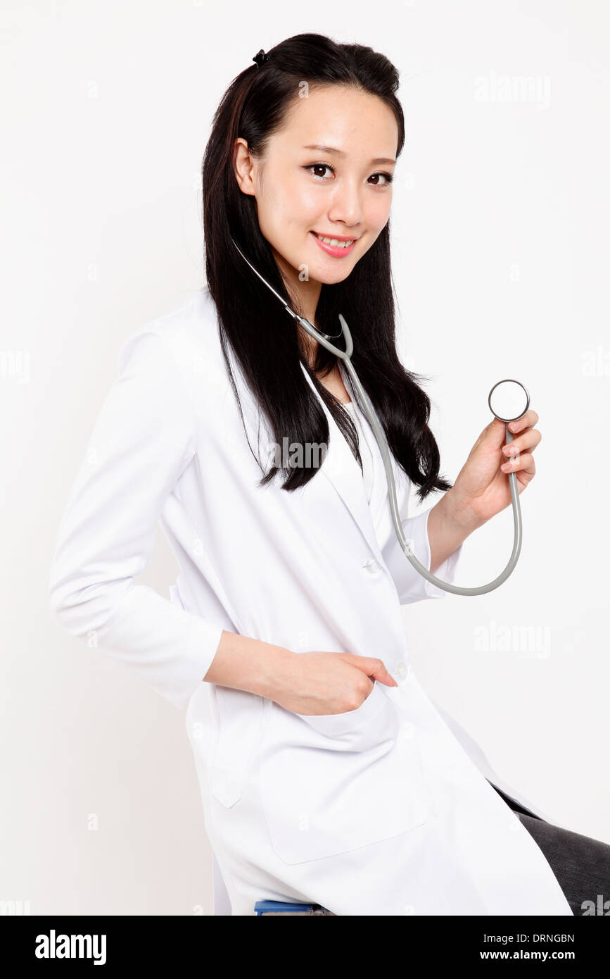 Female doctor takes stethoscope Stock Photo - Alamy