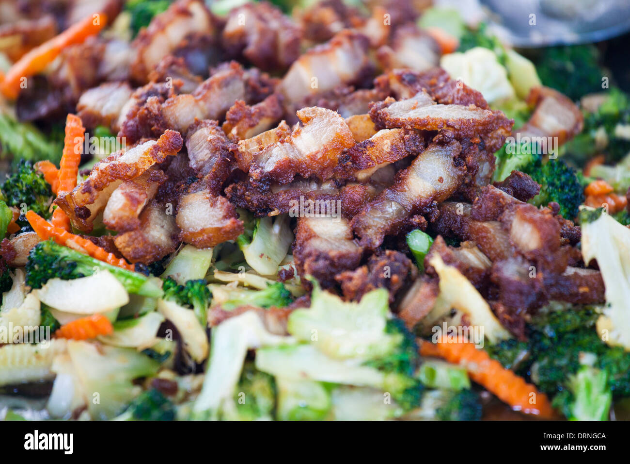 Pork at a street stall in Bangkok, Thailand Stock Photo - Alamy