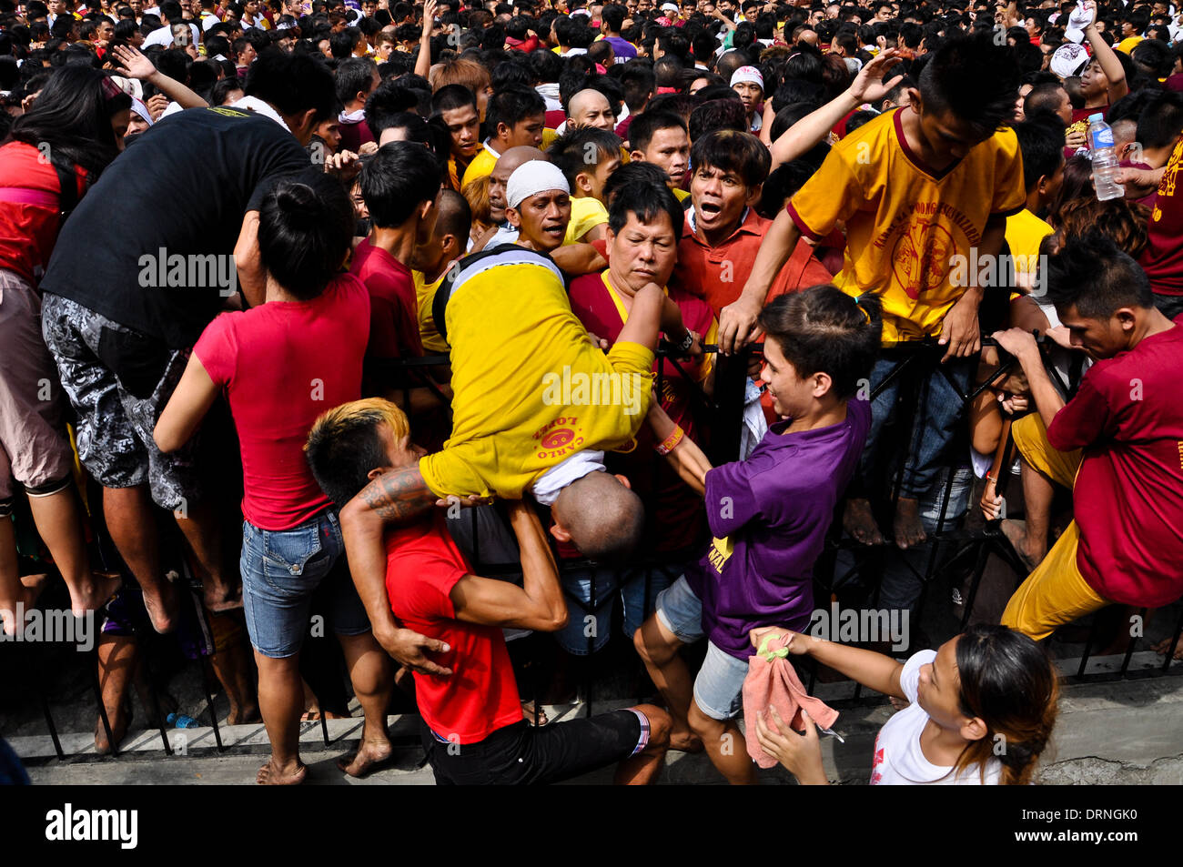 Devotees jostle with each other which cause stampede during the grand ...