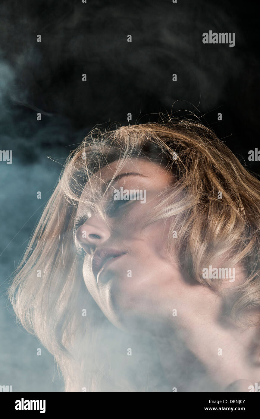 Sensual woman in the mist Stock Photo - Alamy