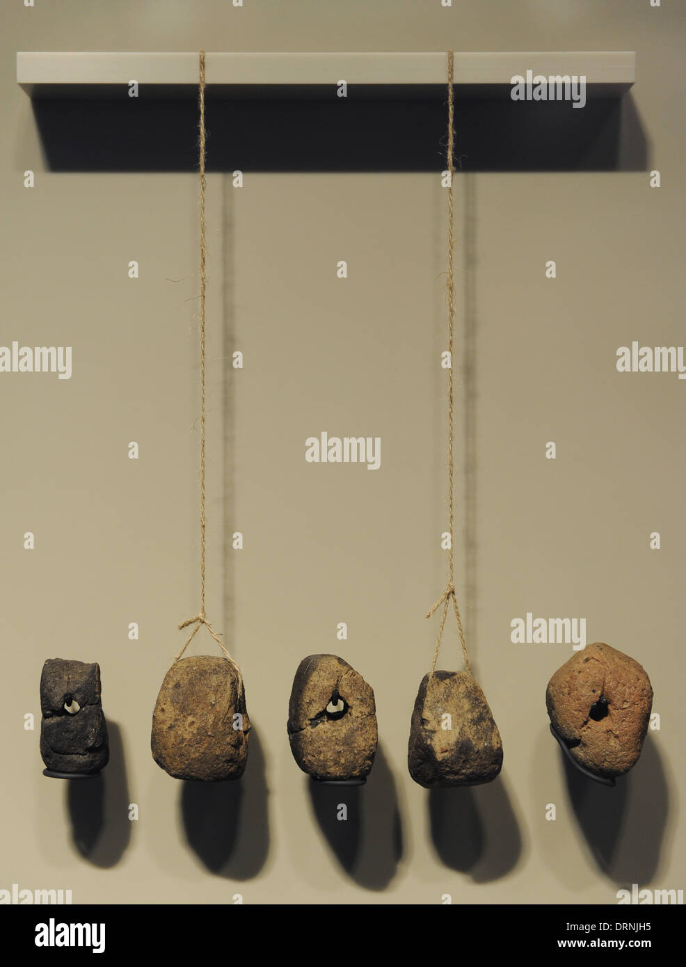 Loom weights hi-res stock photography and images - Alamy