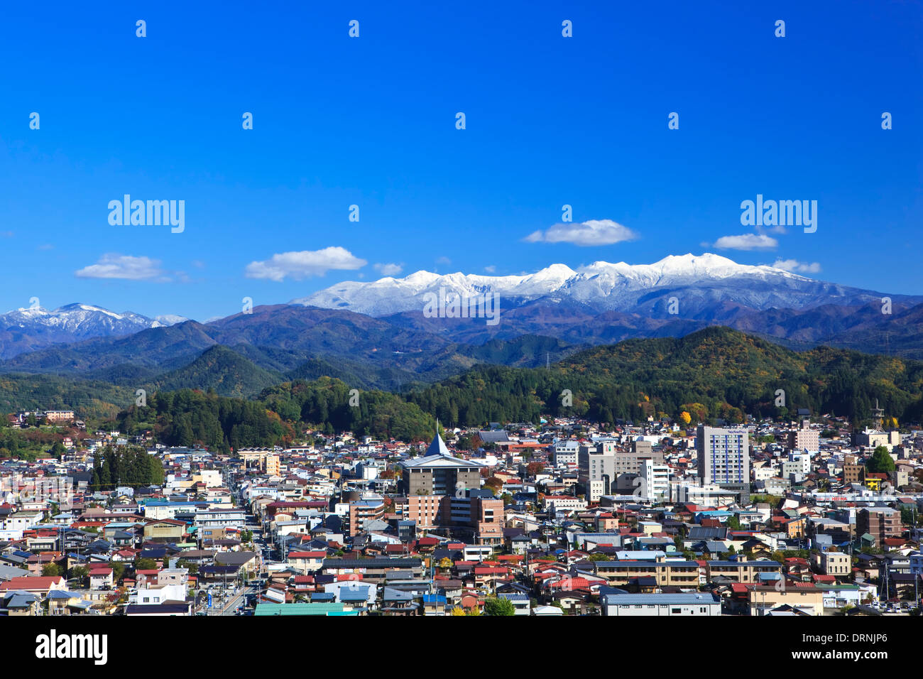 Norikura mountain of blue sky and Hida Takayama Stock Photo - Alamy