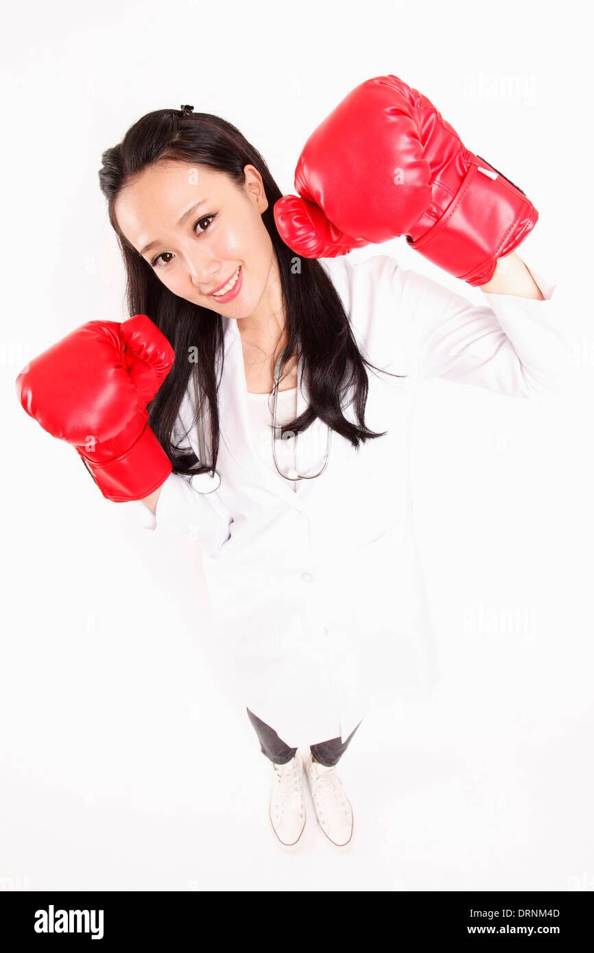 Female doctor plays boxing for exercise Stock Photo - Alamy
