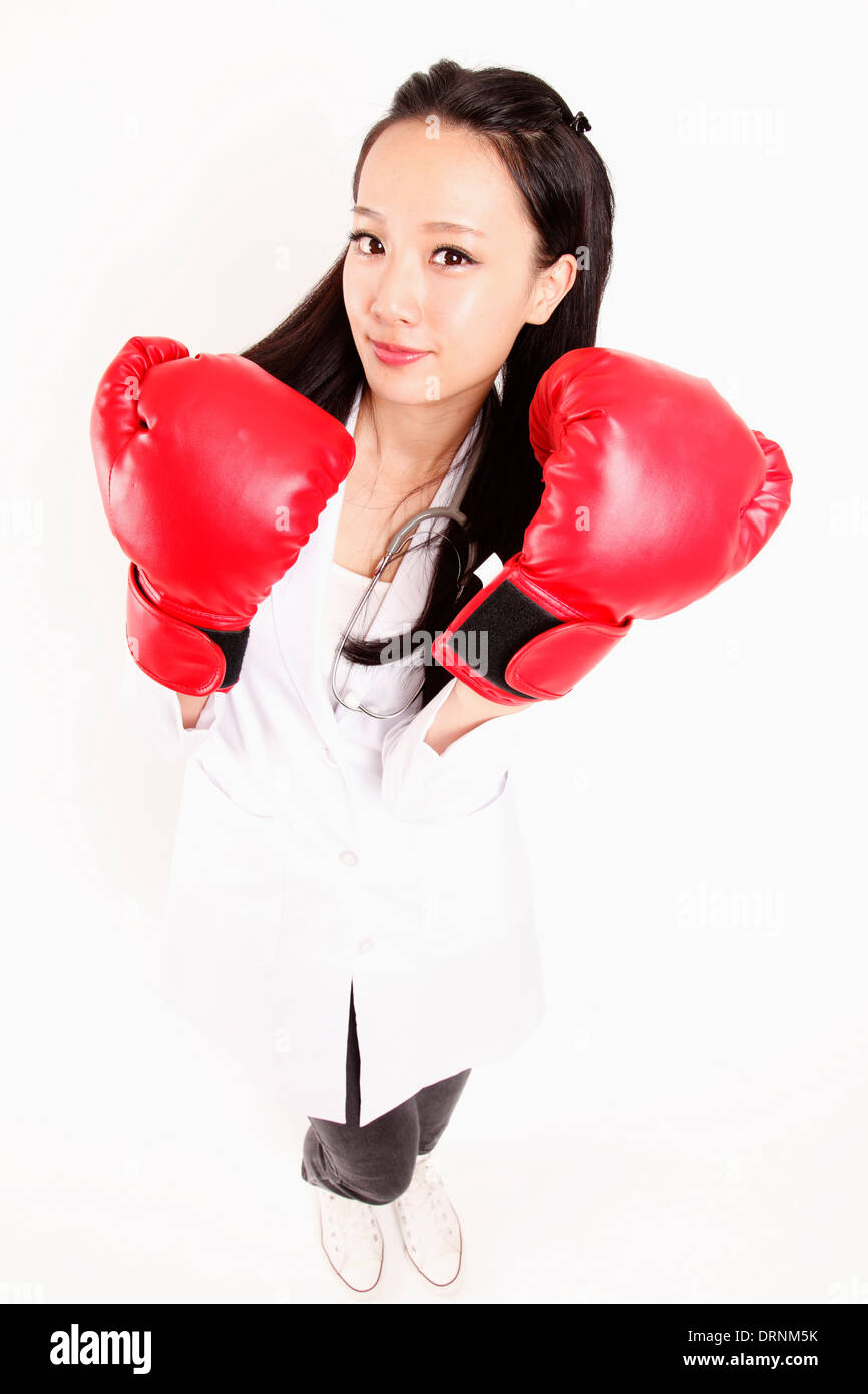 Female doctor plays boxing for exercise Stock Photo - Alamy