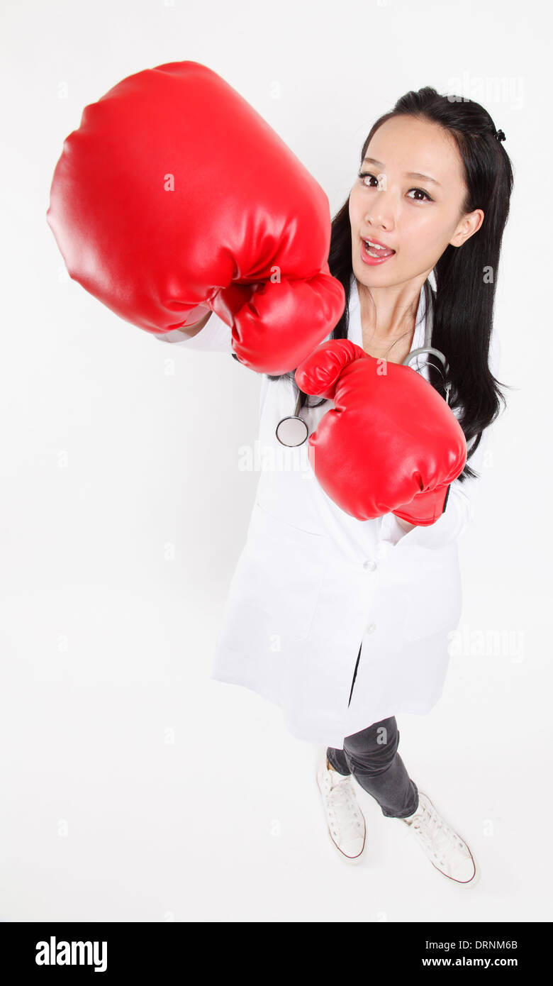 Female doctor plays boxing for exercise Stock Photo - Alamy