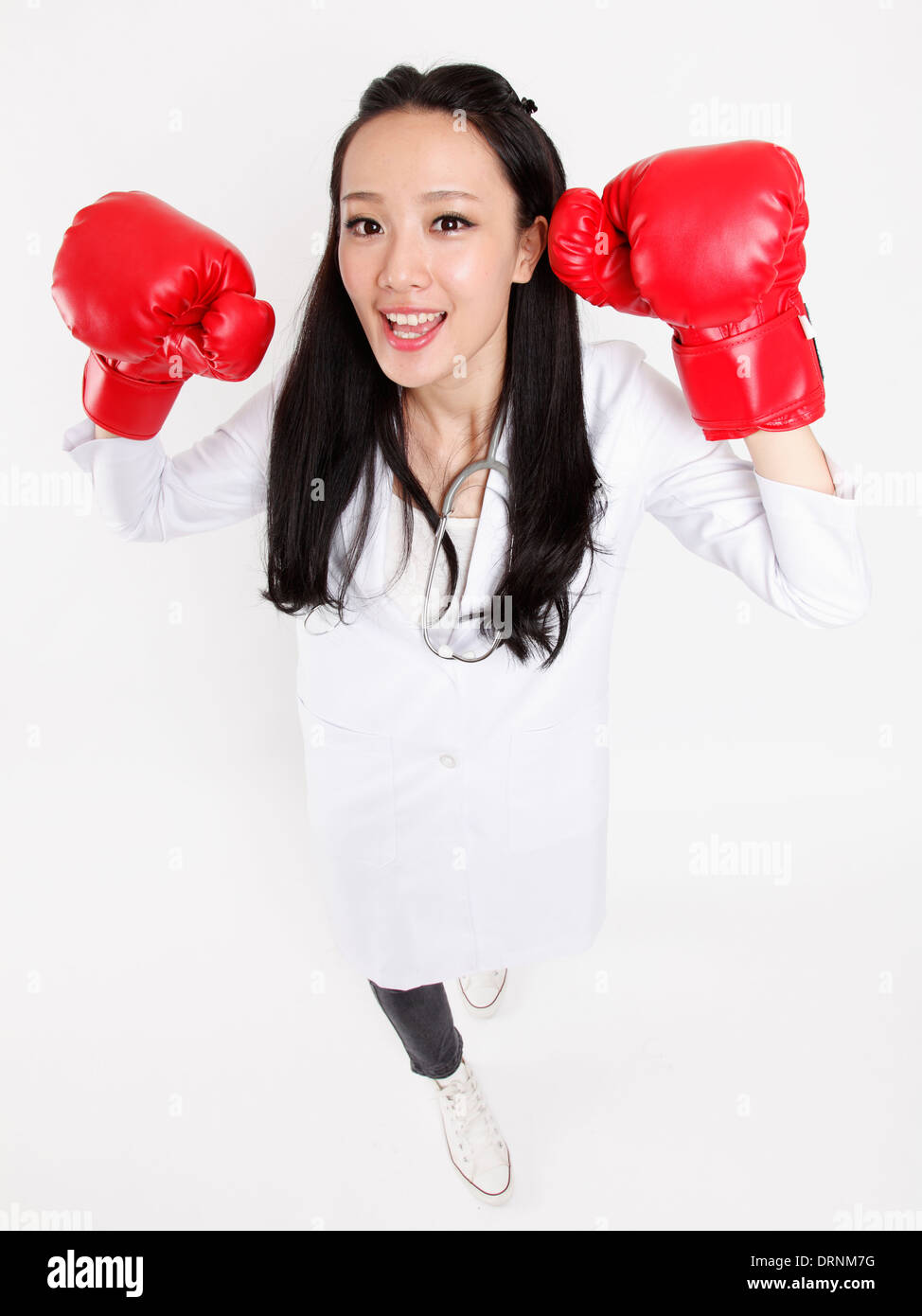 Female doctor plays boxing for exercise Stock Photo - Alamy