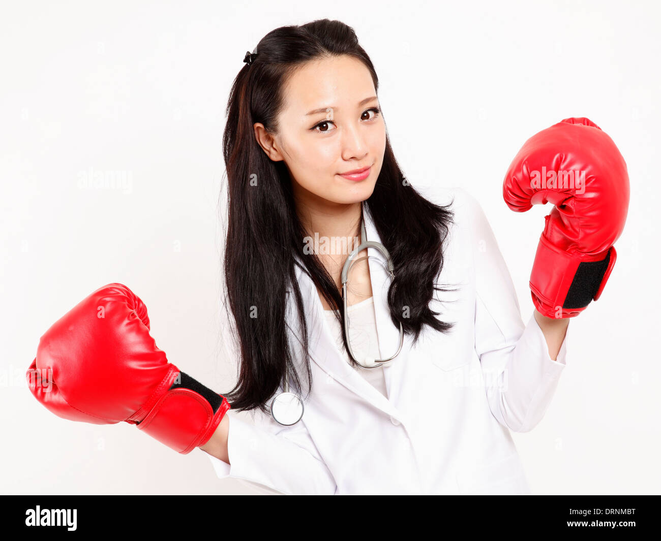 Female doctor plays boxing for exercise Stock Photo - Alamy