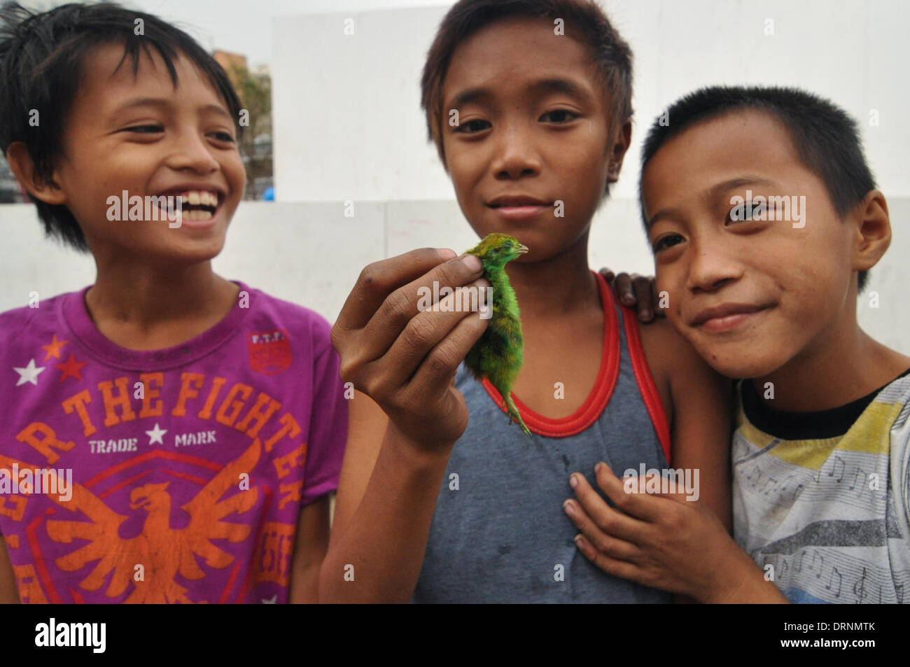Children in streets manila philippines hi-res stock photography and ...