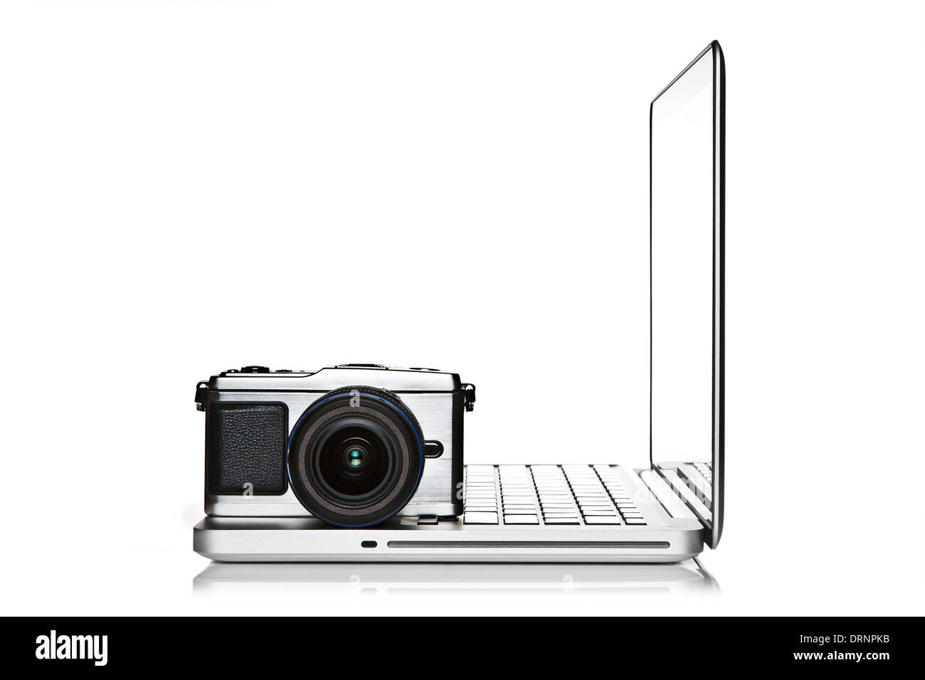 Camera and laptop Stock Photo - Alamy