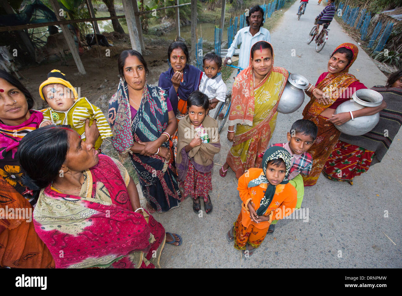 Villagers in a remote subsistence farming village on an island in the ...