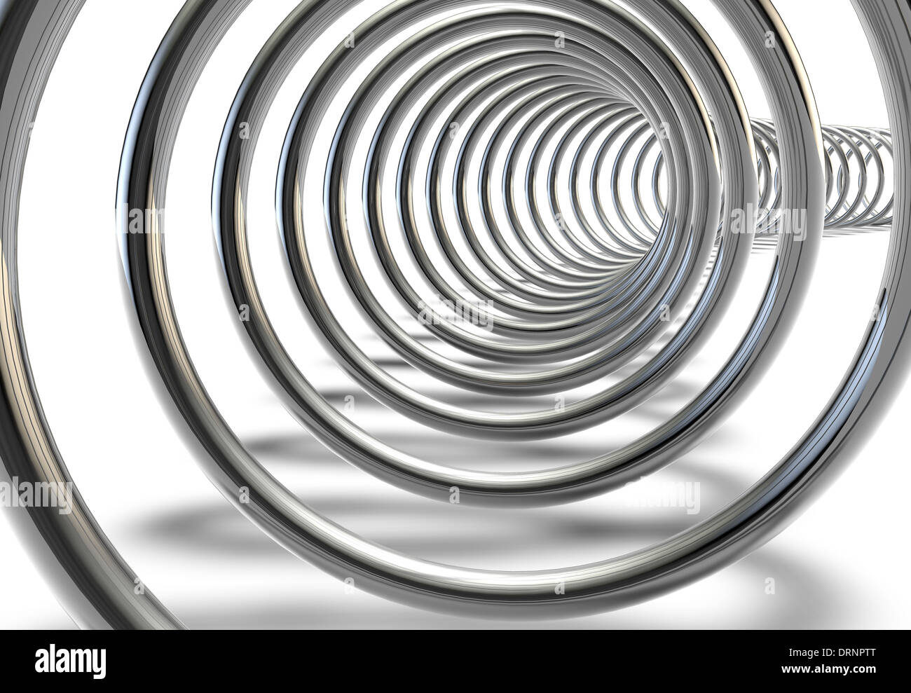 Metal spring on a white background Stock Photo - Alamy