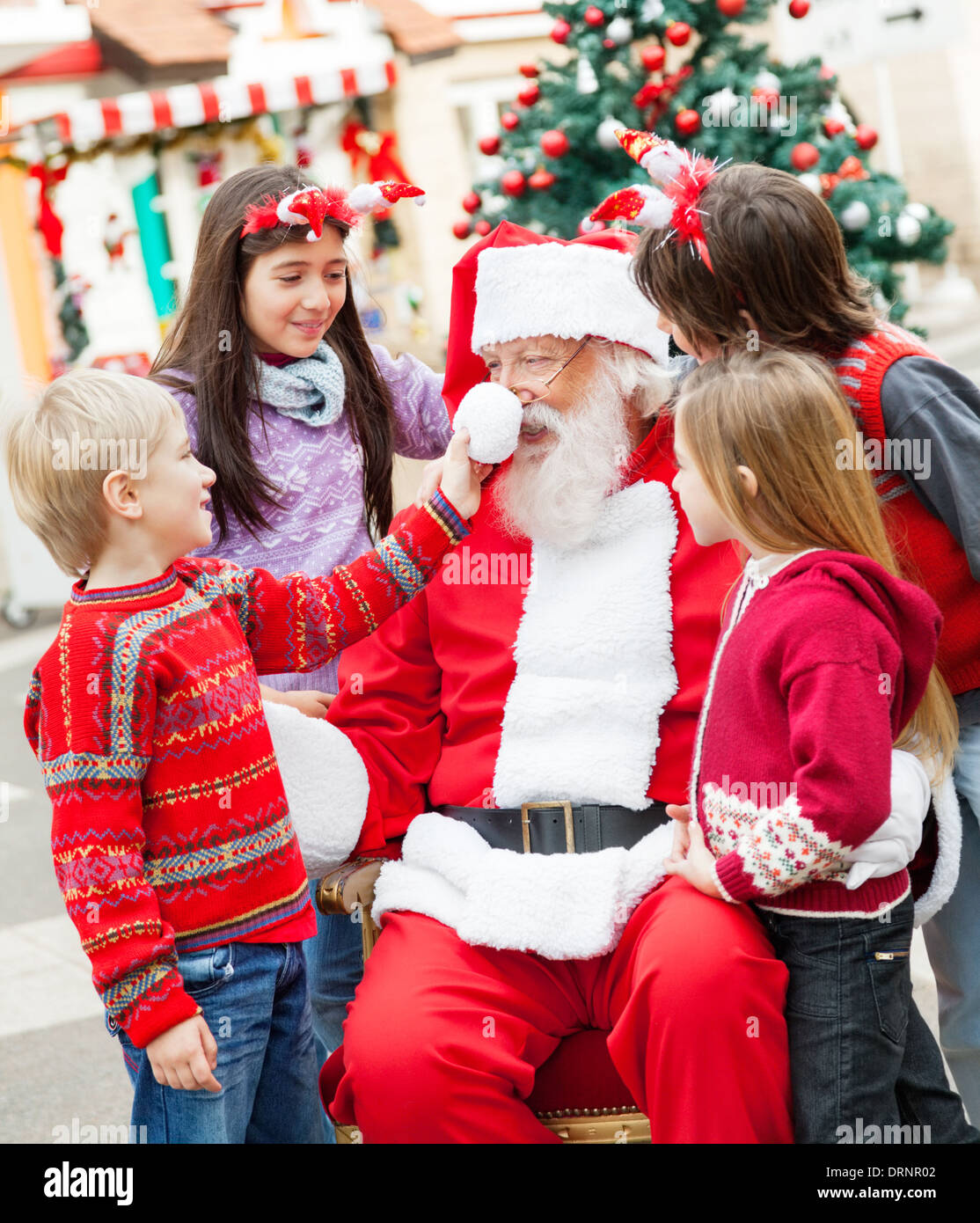 Friends playing santa claus hi-res stock photography and images - Alamy