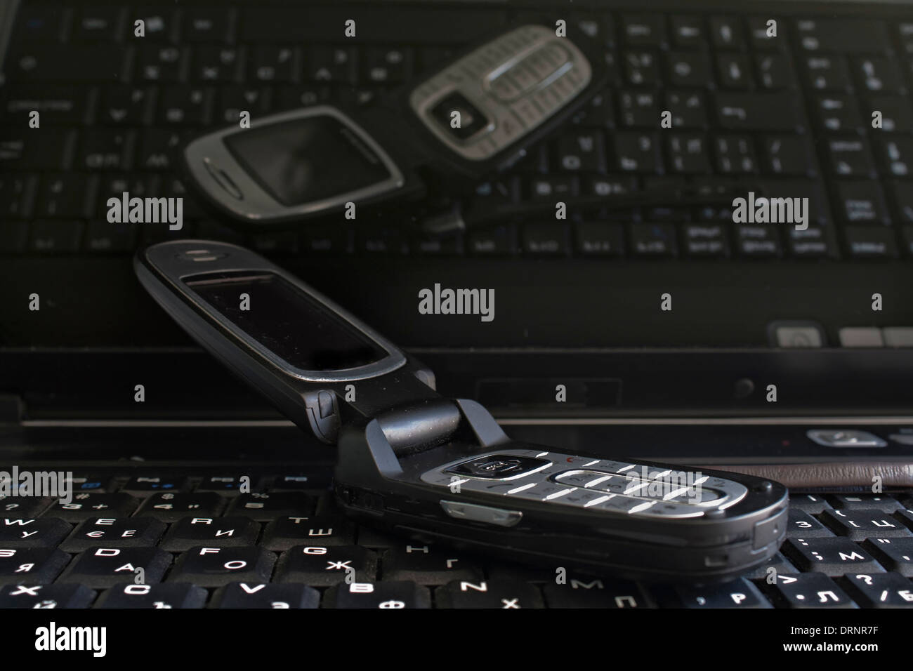 Black keyboard and black GSM Stock Photo - Alamy