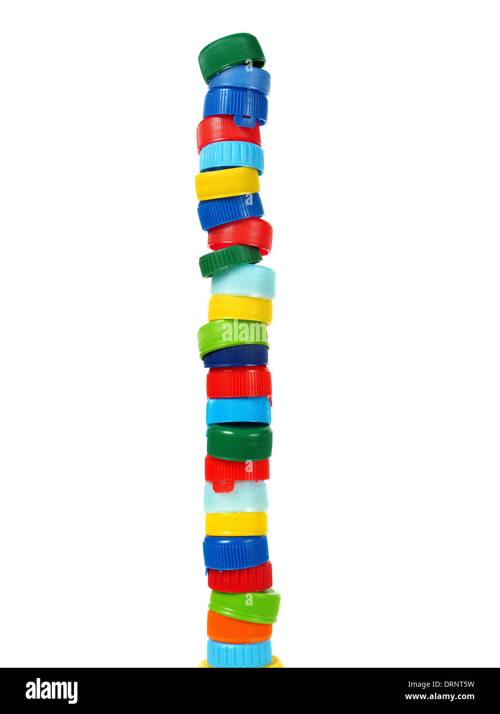 Stack made from bottle caps on white background Stock Photo - Alamy