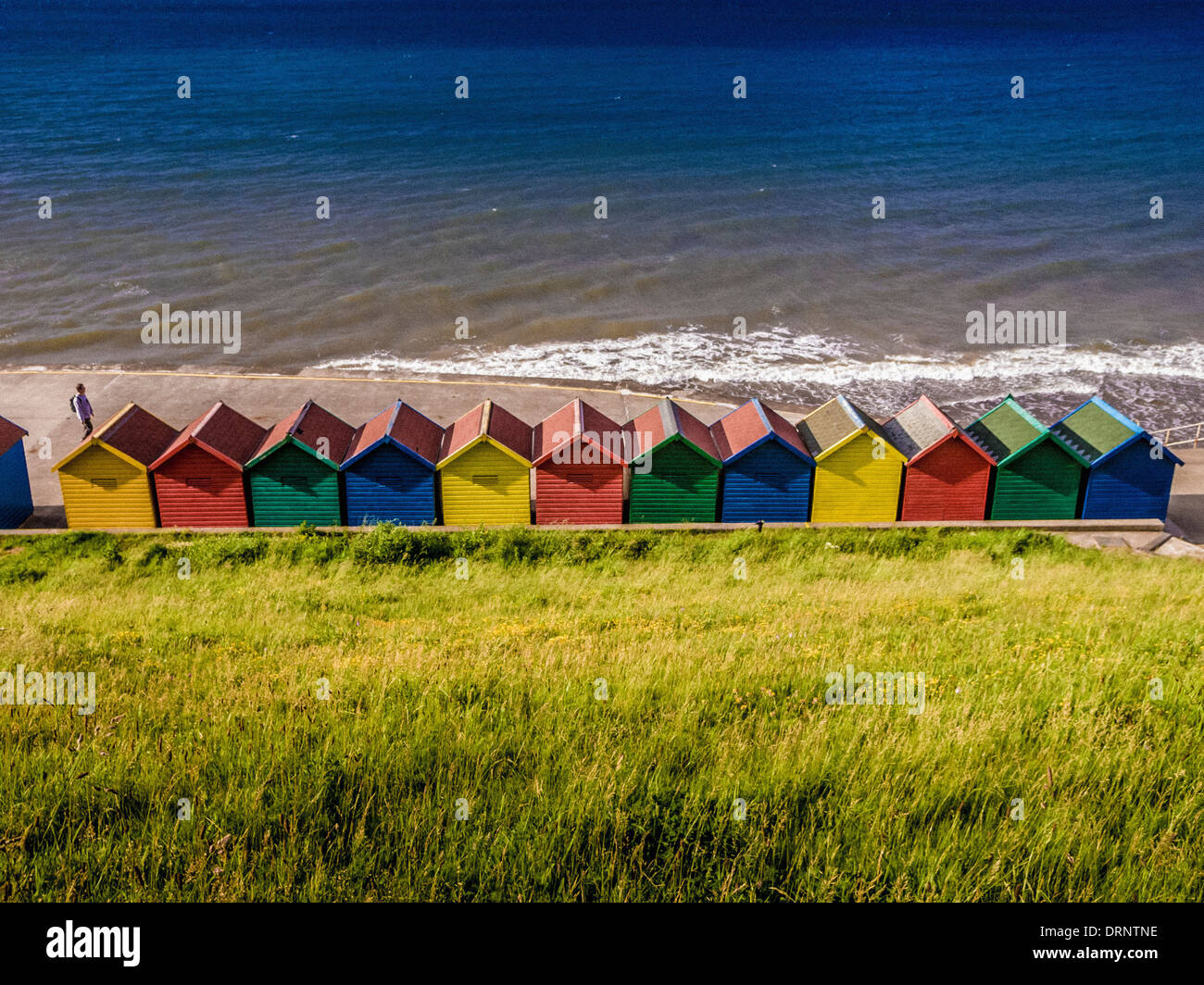Colourful West Cliff beach huts, Whitby, North Yorkshire. Shot from ...